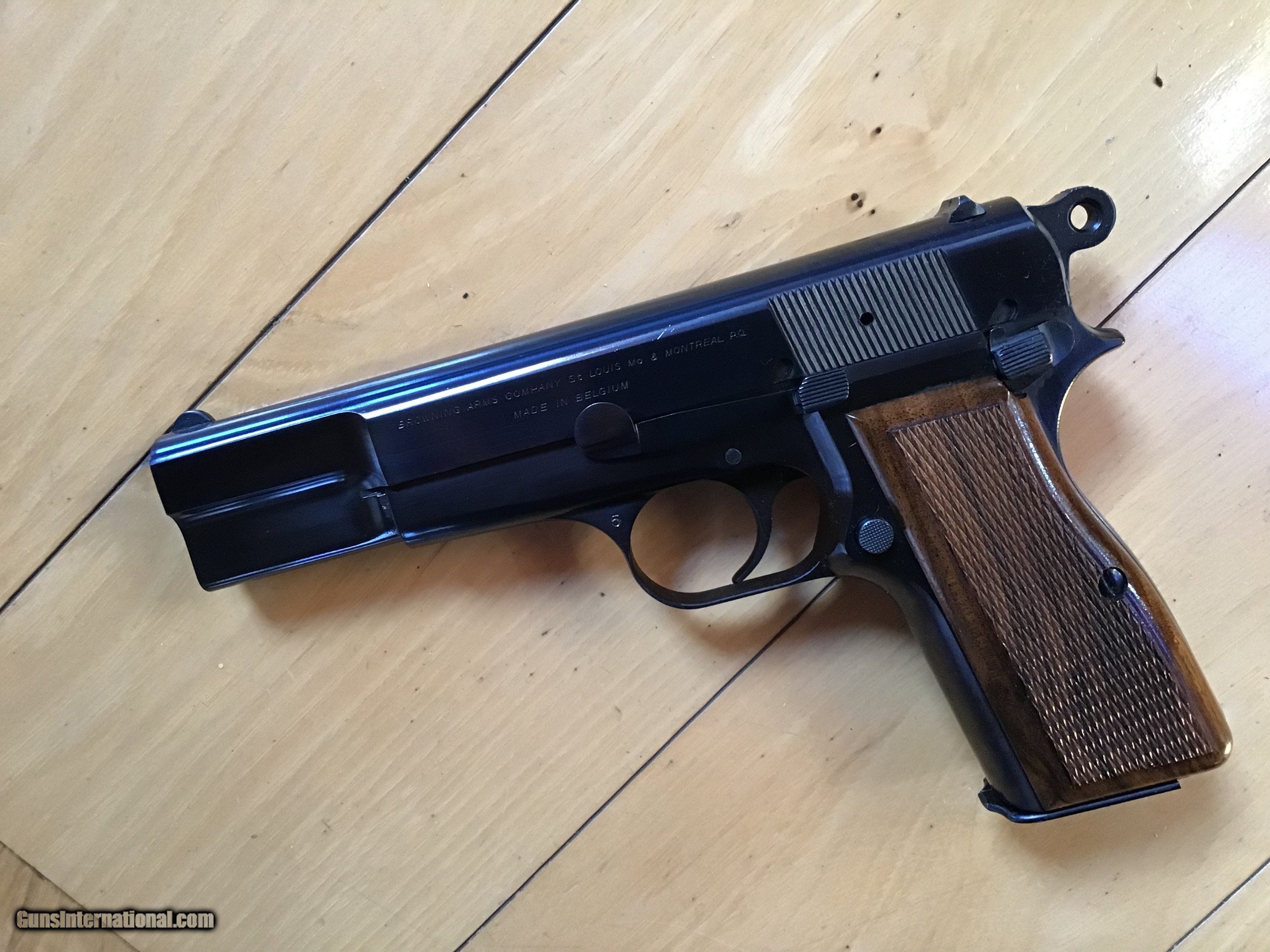 SOLD——-BROWNING HIGH POWER 9MM, T SERIES, RING HAMMER, APPEARS UNFIRED WITH BROWNING ZIPPER CASE ...