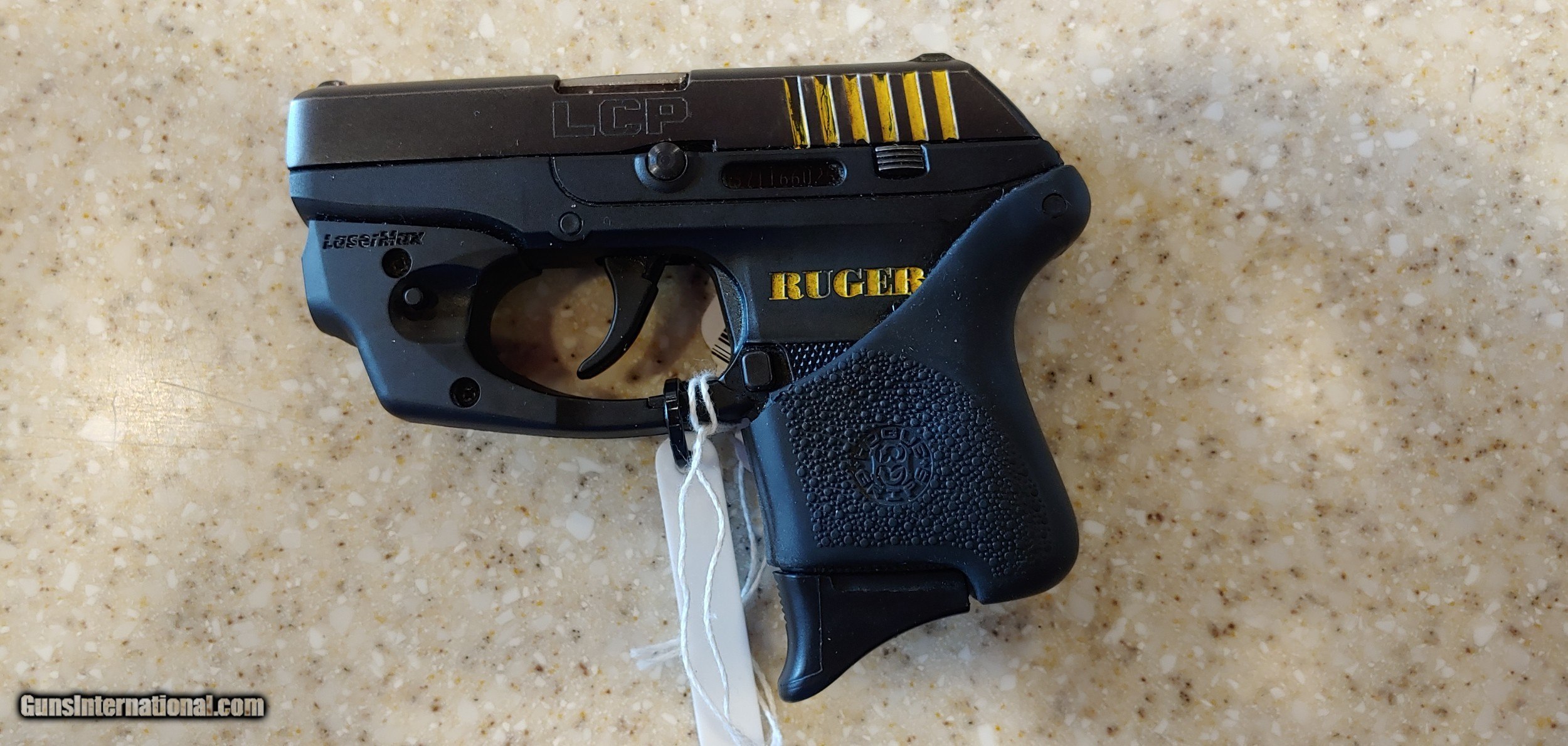 USED RUGER LCP .380 ACP OWNER COLORED LETTERING YELLOW WILL CLEAN OFF ...