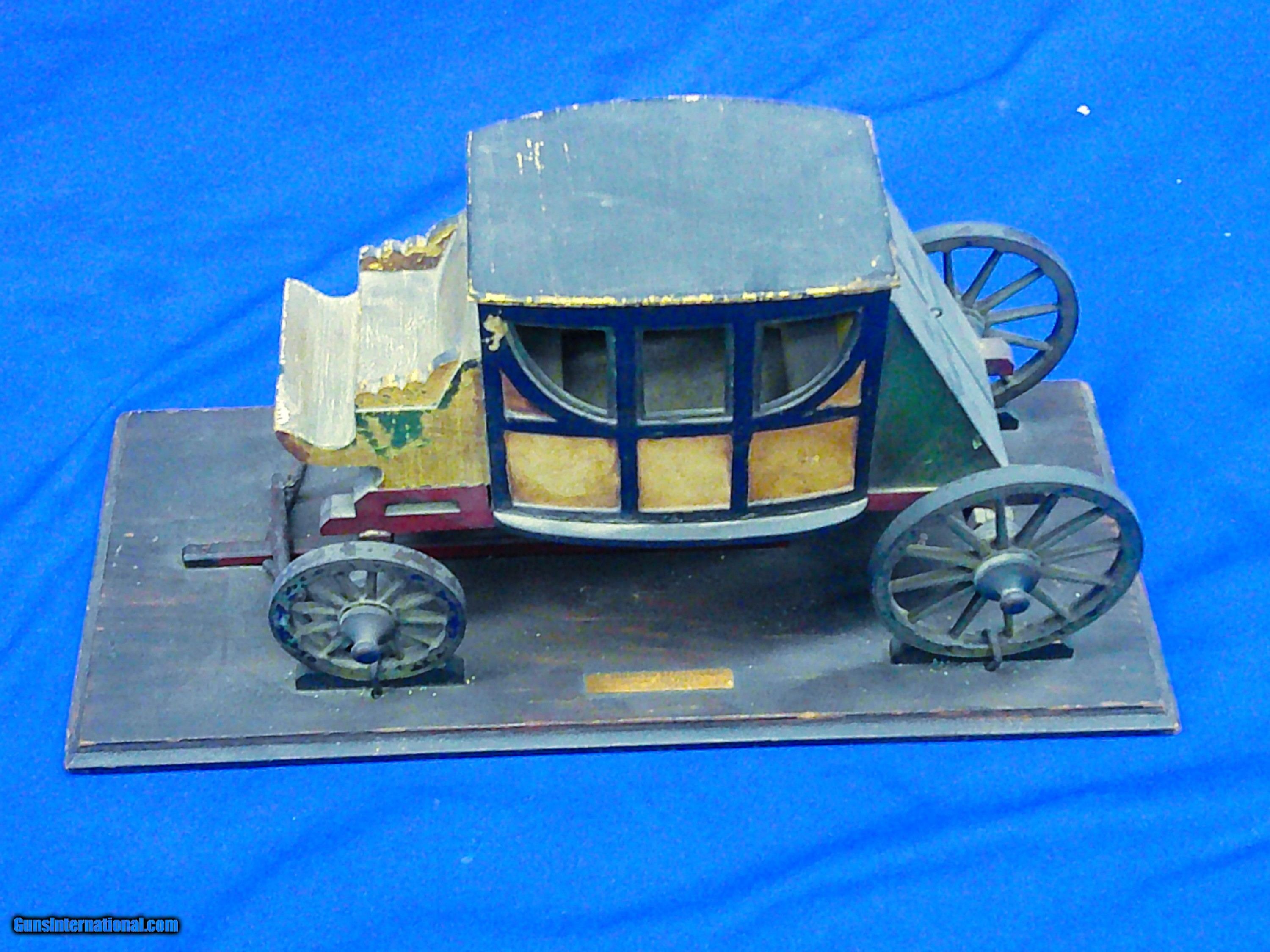 An Early 1800's Wood Carved Model of a 1700's American Stage Coach for sale
