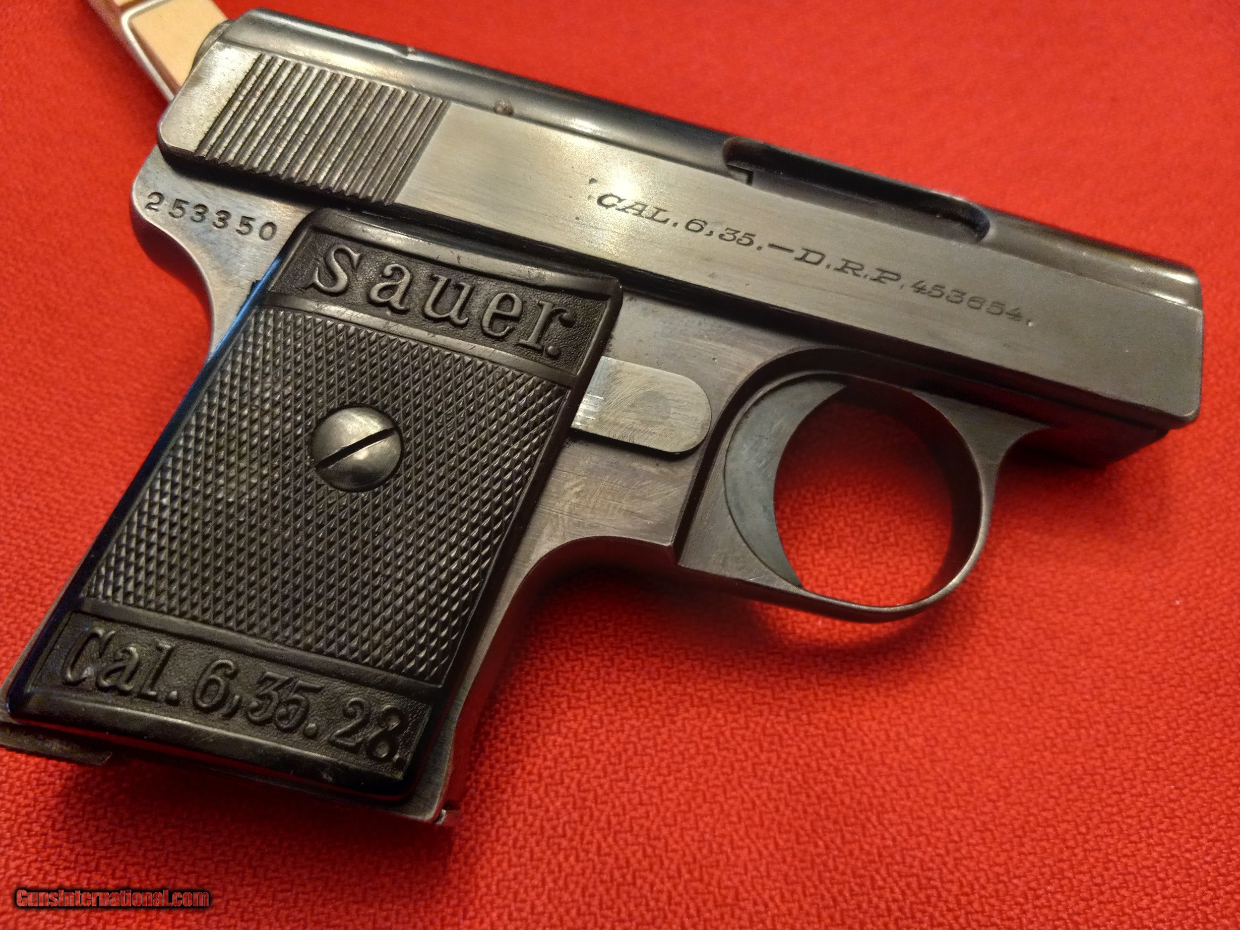 J. P. Sauer and Sohn WTM type 33 and two Baby Brownings