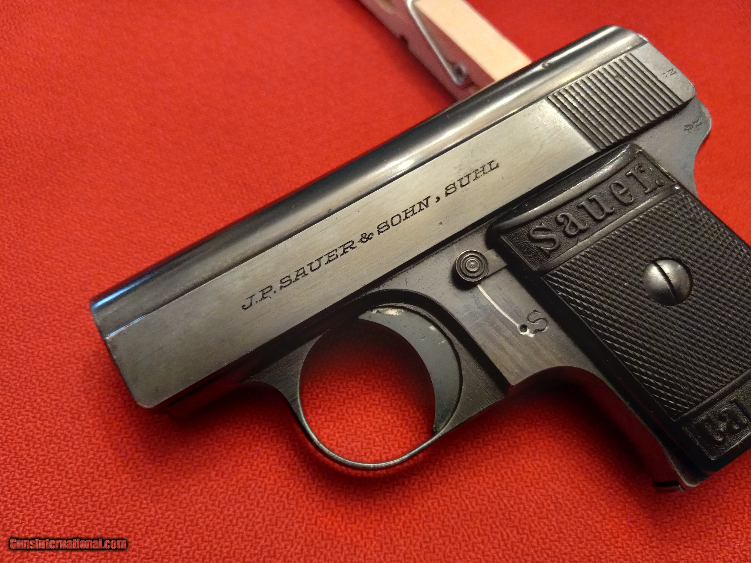J. P. Sauer and Sohn WTM type 33 and two Baby Brownings