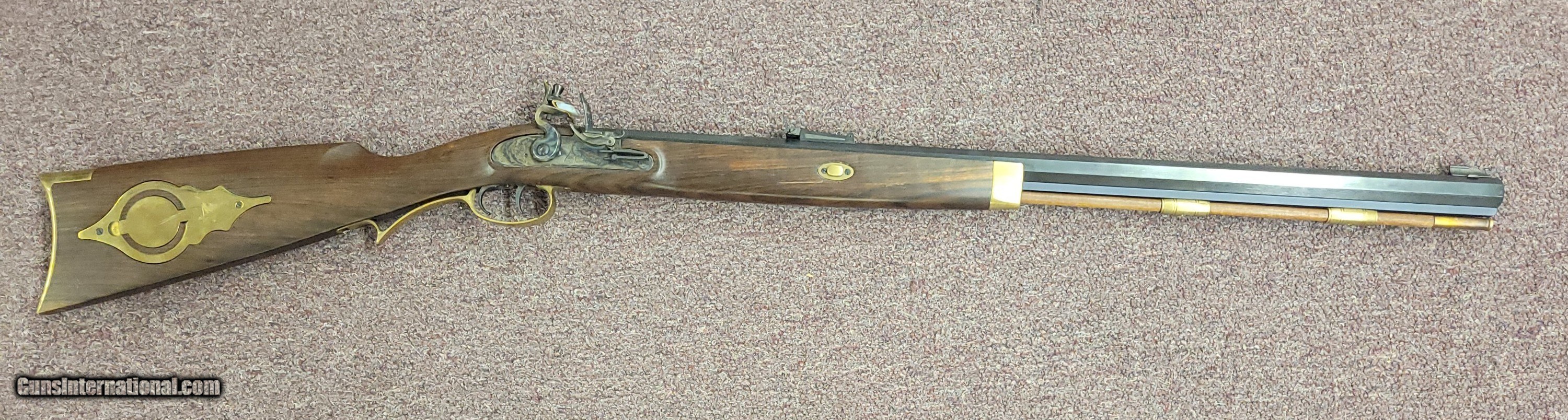 Flintlock Hawken rifle - 50 cal flintlock by Cabela's