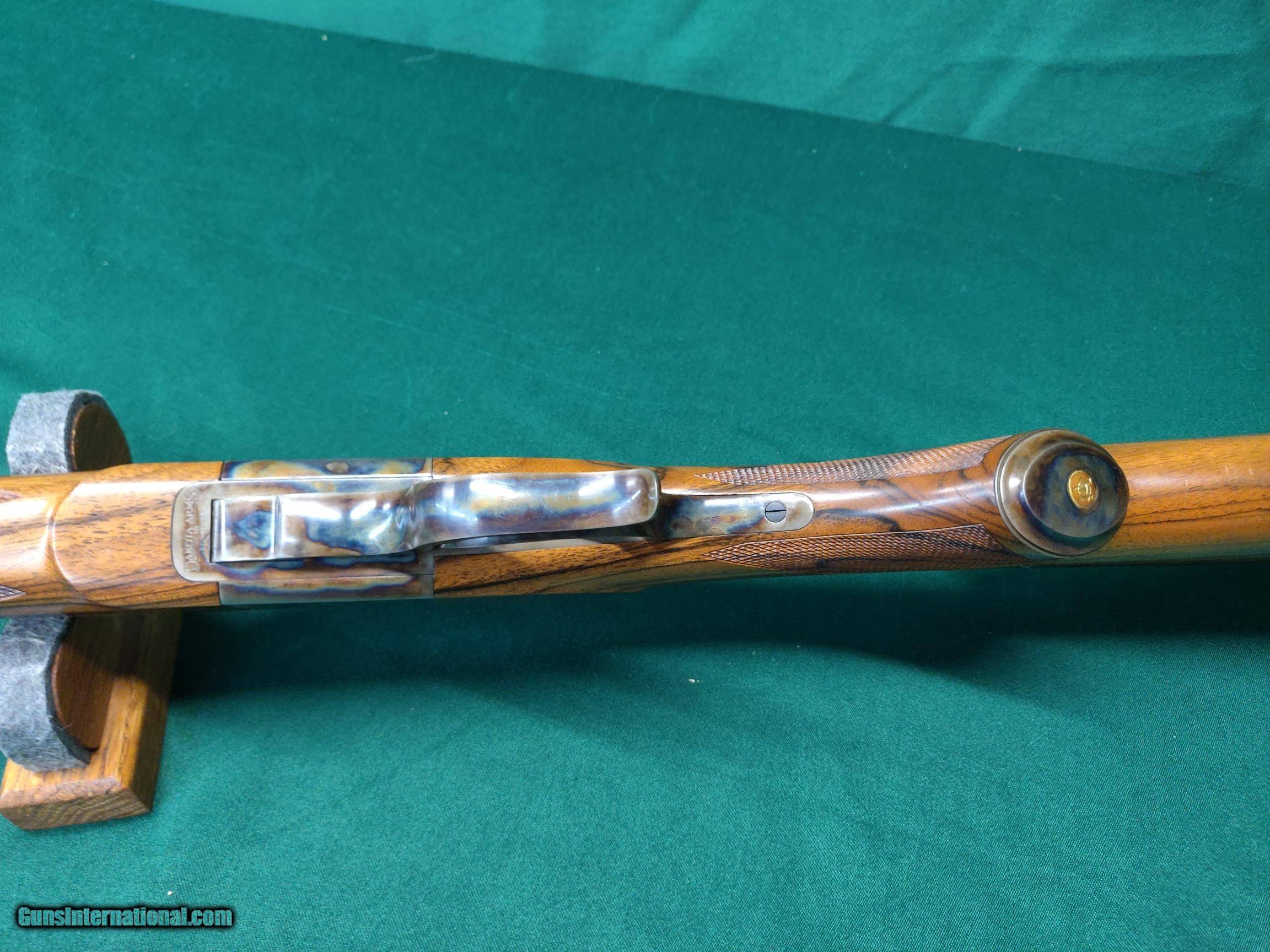 Dakota model 10 Deluxe in 257 Roberts, color cased frame, European walnut