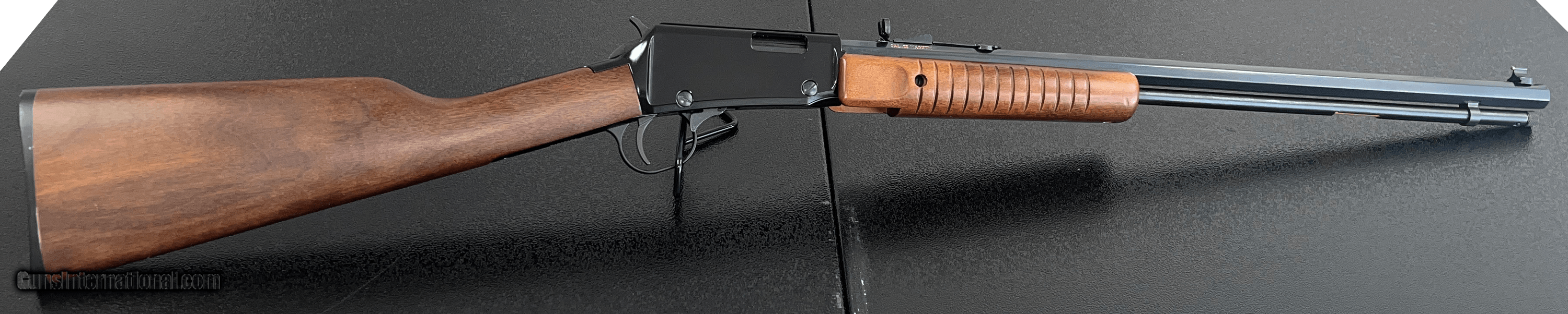 Henry Pump Action Octagon .22 Magnum 20" Barrel Walnut Stock