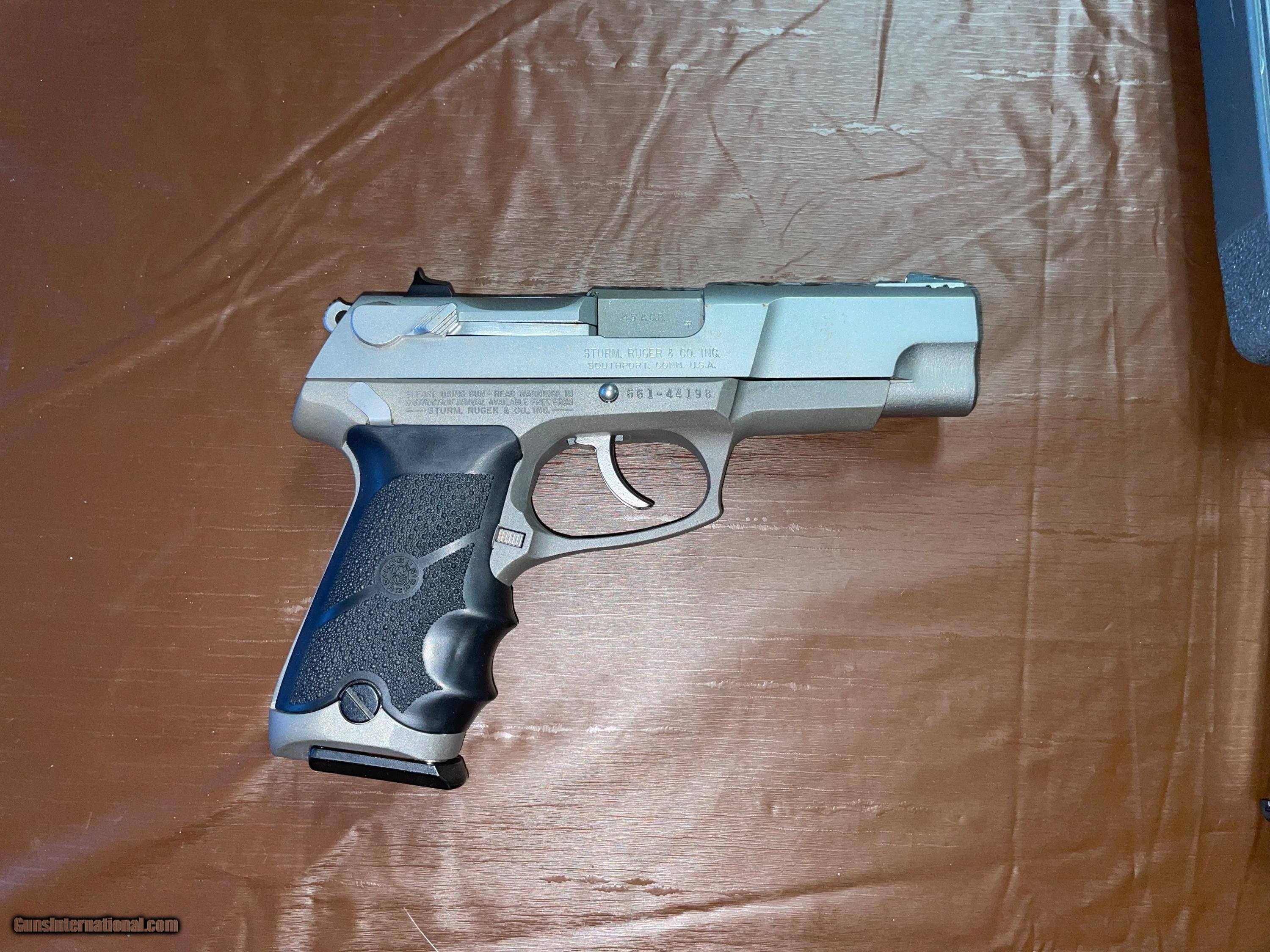 Ruger P90 45acp with box and 4 mags