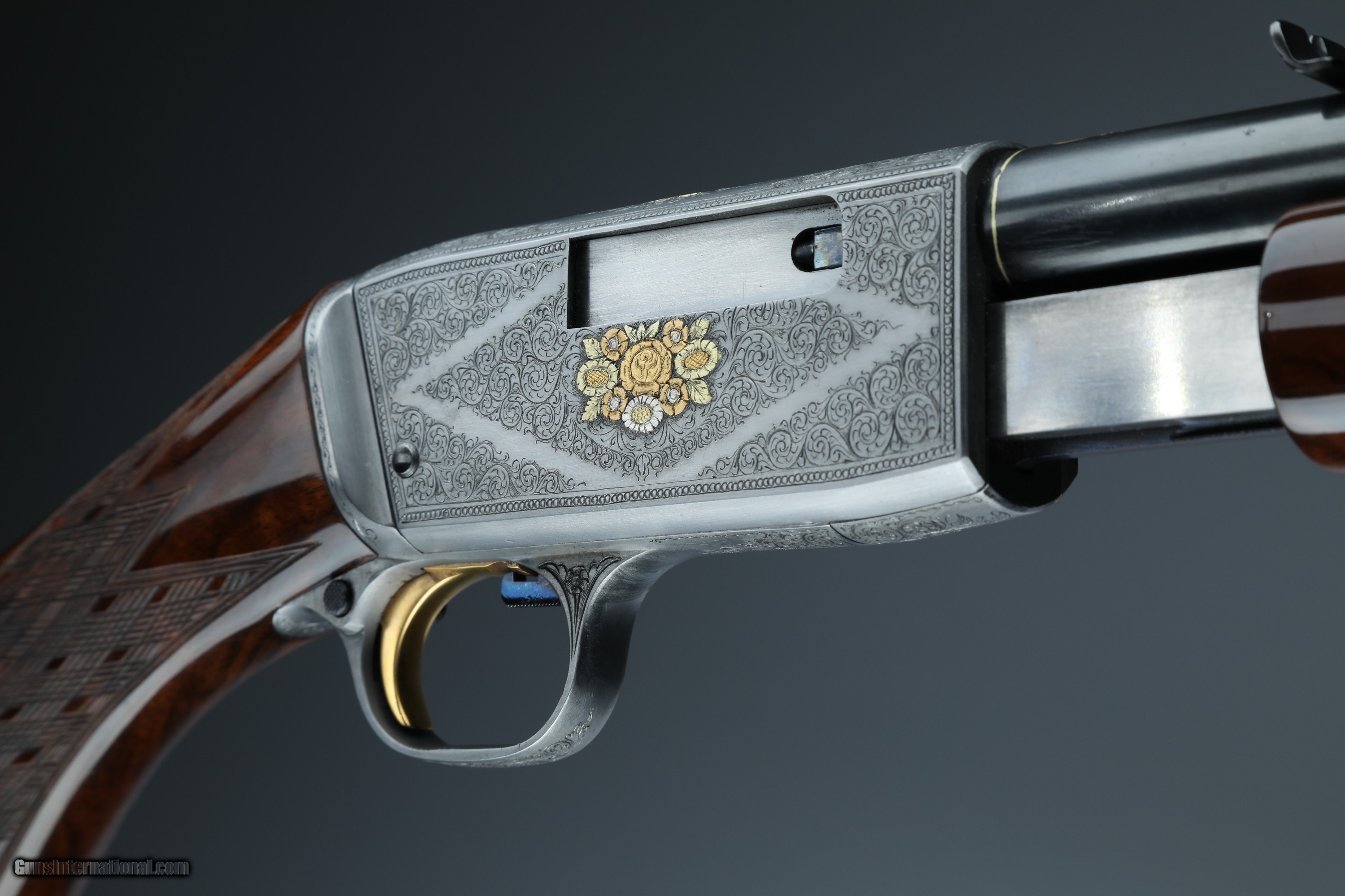 Browning pump-action "Trombone" rife in 22LR engraved by master ...