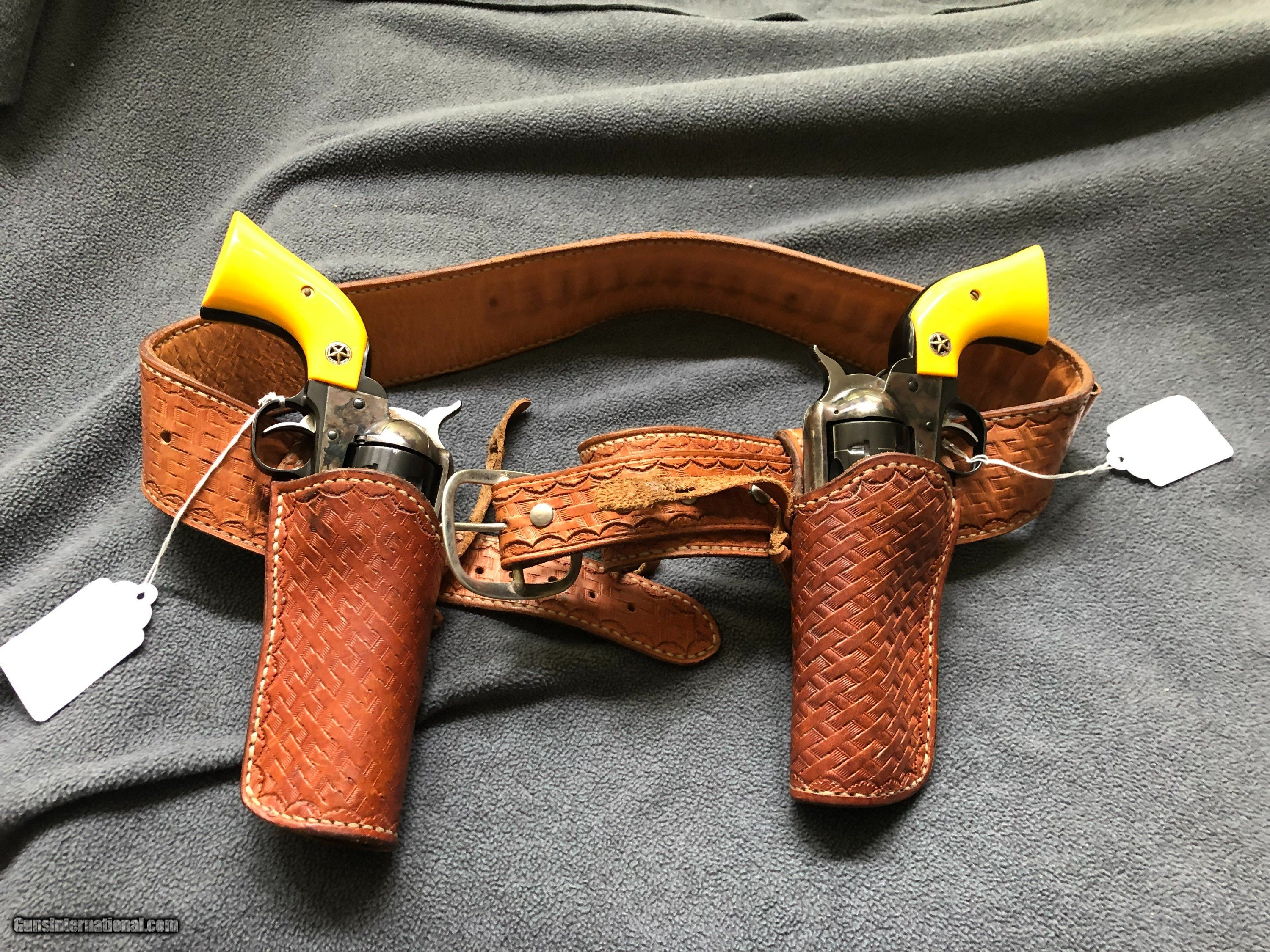 VINTAGE COWBOY ACTION RIG 2 357 PISTOLS WITH DOUBLE HOLSTER AND BELT