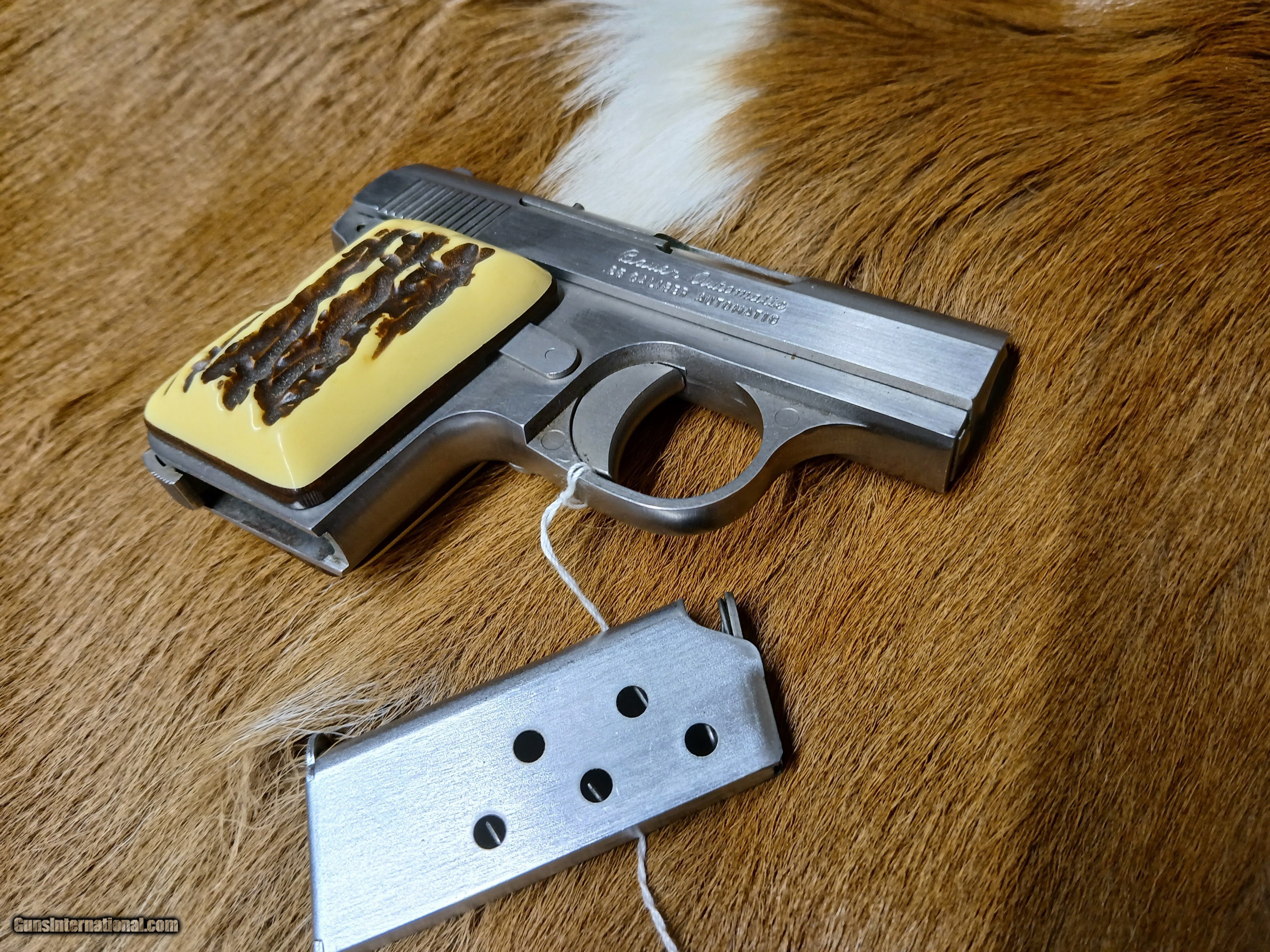 Bauer .25 Auto with Stag grips and one 6 round magazine.