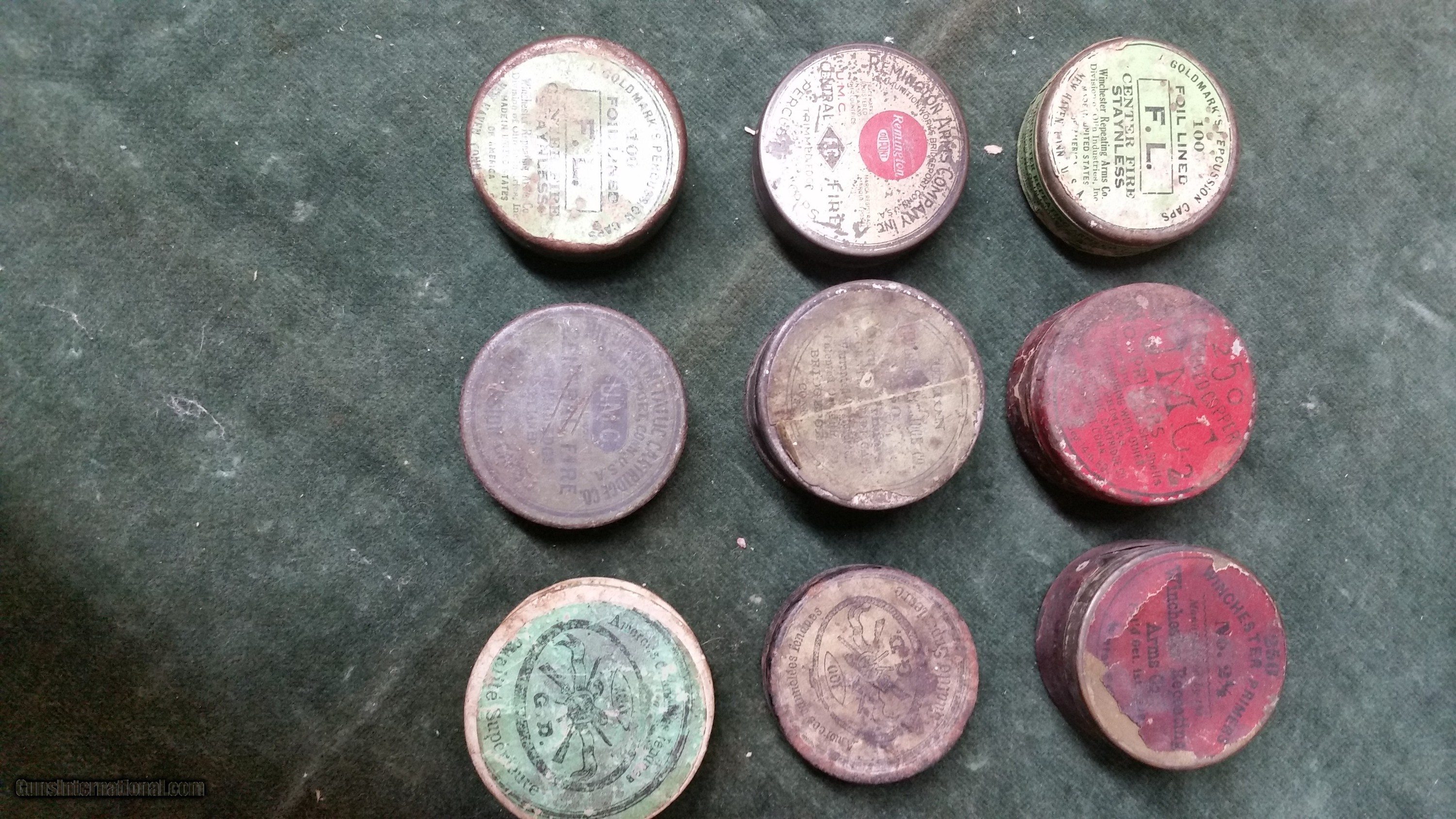 Assorted tins of old percussion caps