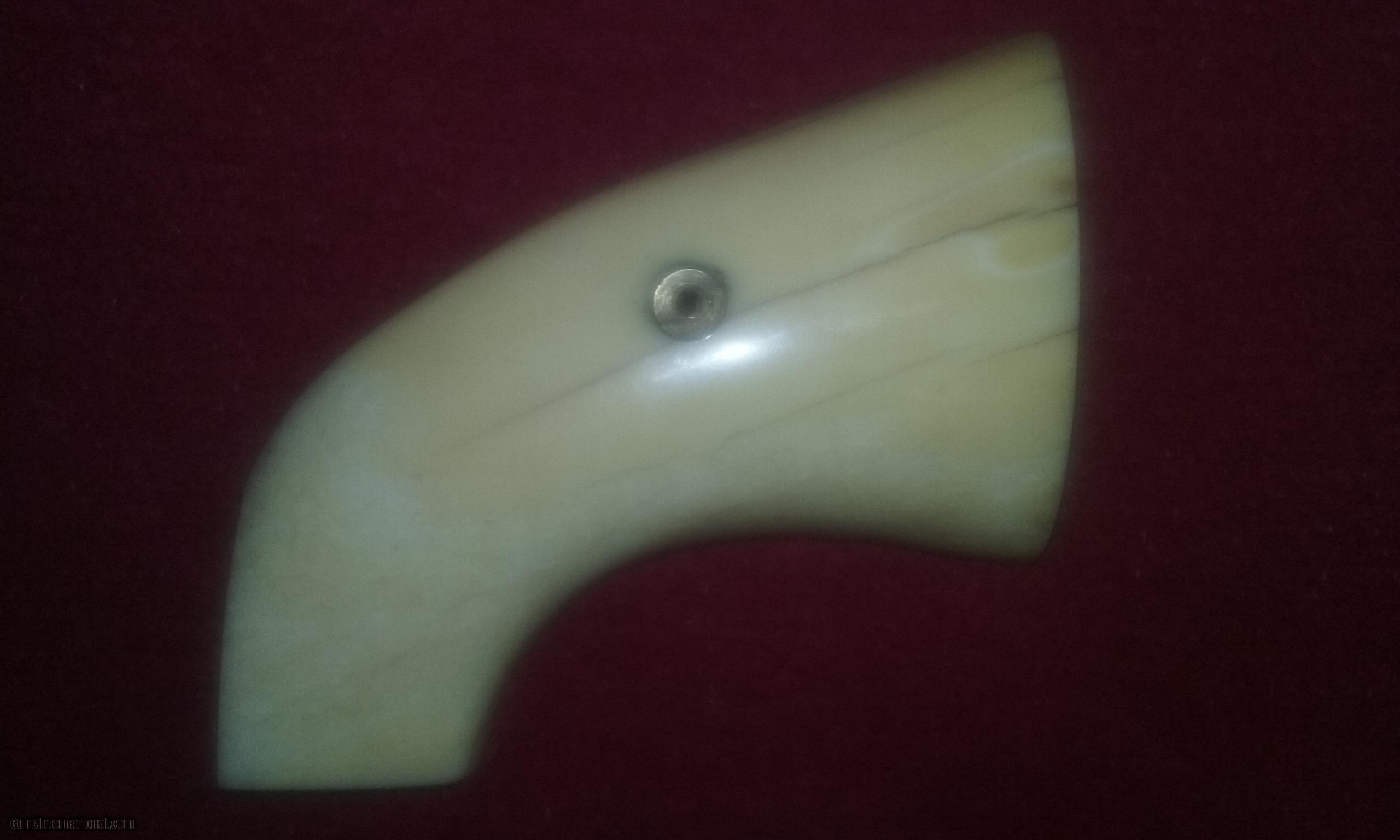 Custom vintage ivory revolver grips