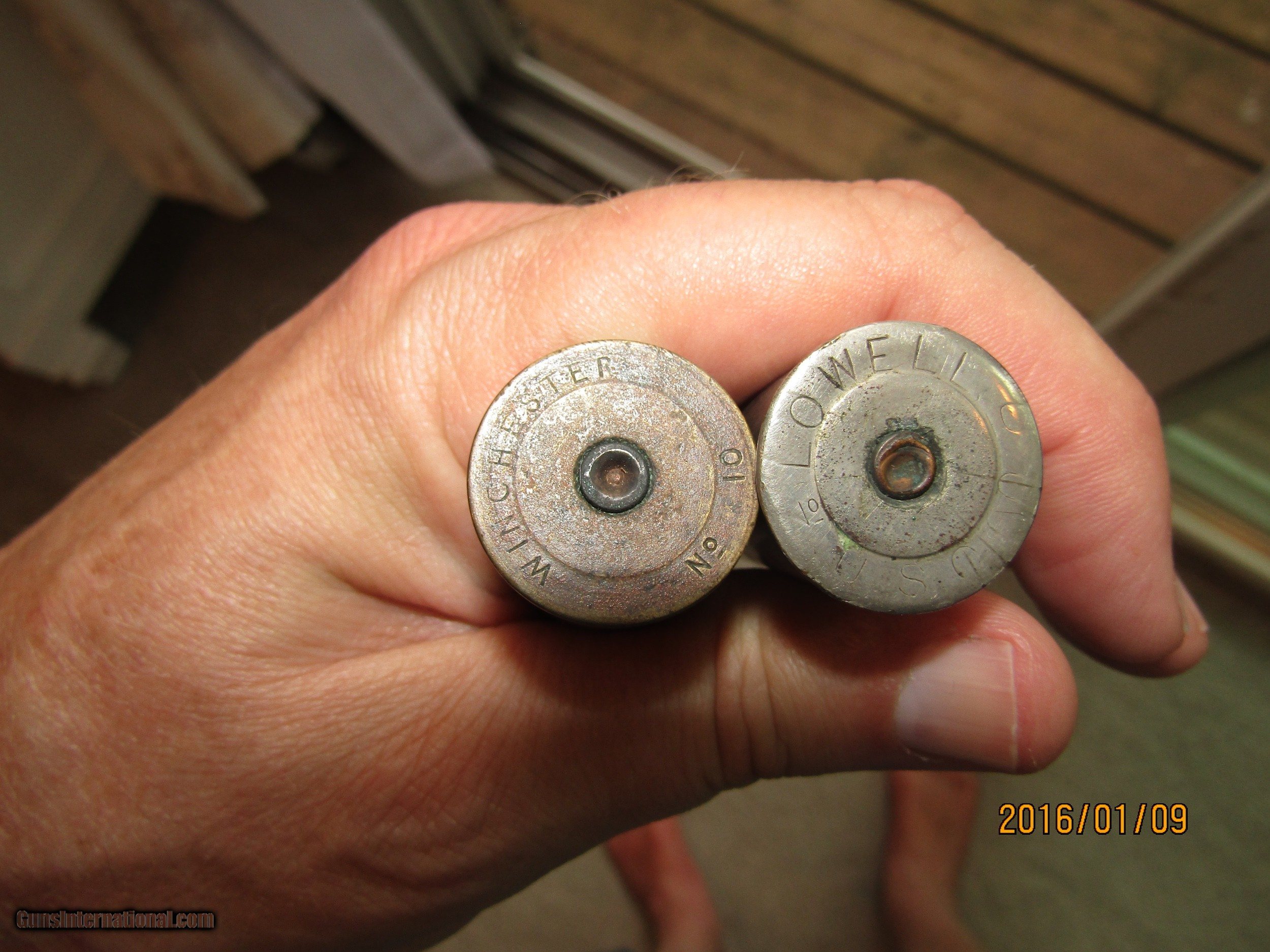 12 brass vintage ,10 gage, shotgun shells ,winchester & lowell