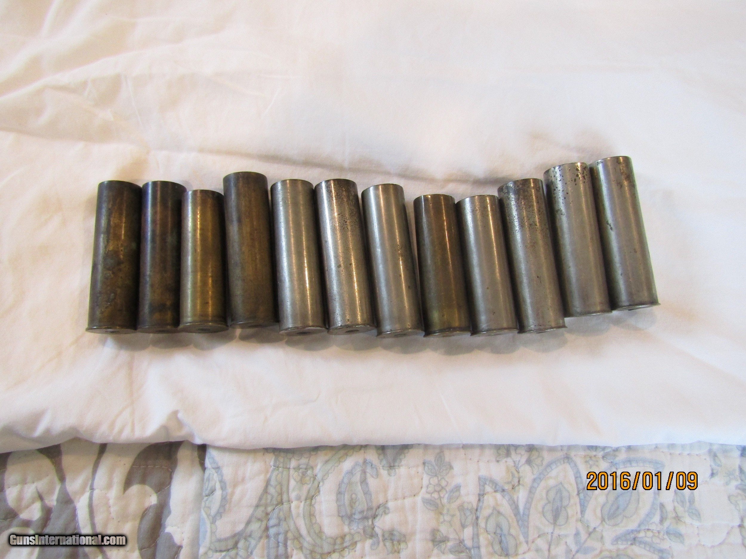 12 brass vintage ,10 gage, shotgun shells ,winchester & lowell