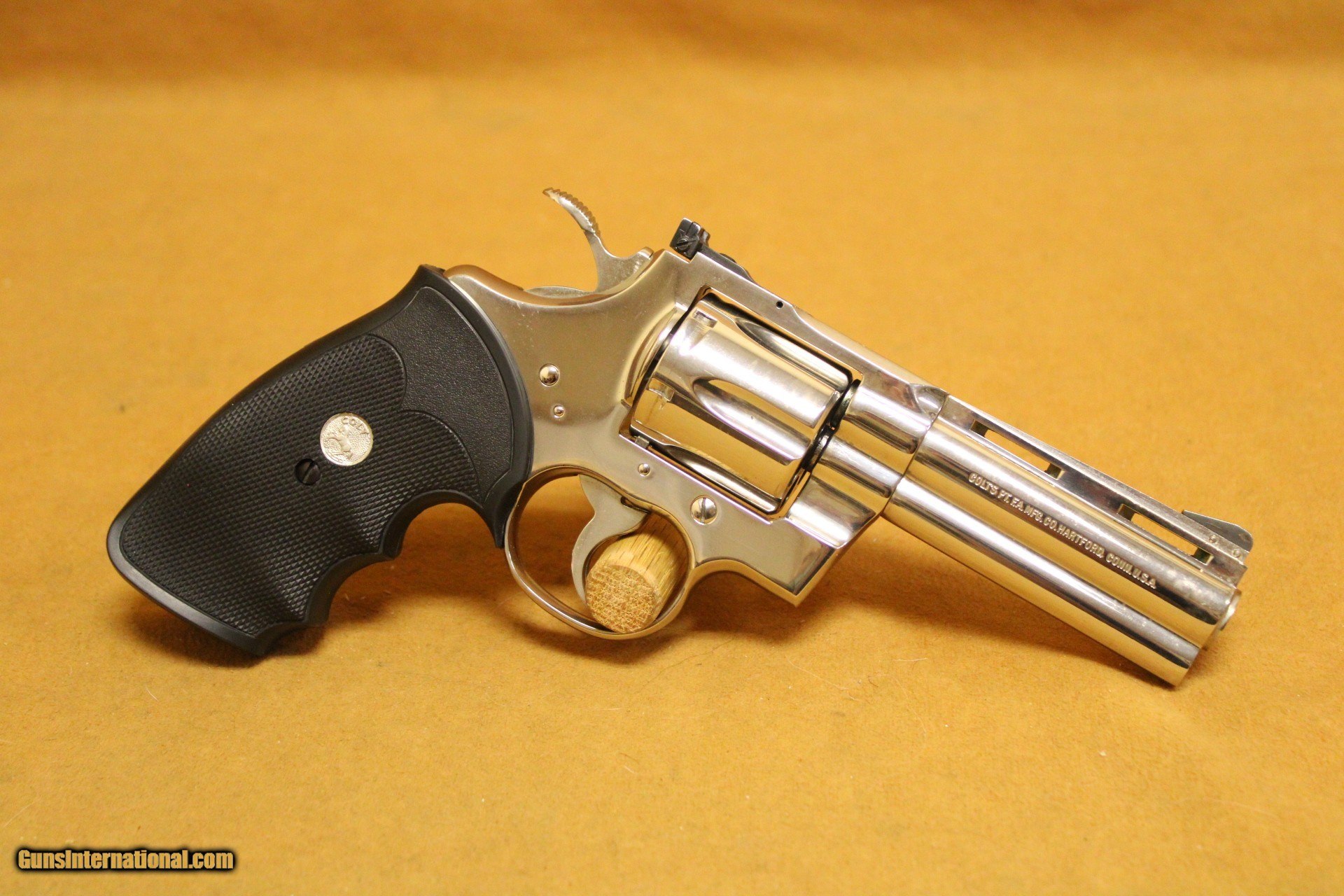 Vintage Colt Python (Nickel, 357 Magnum, 4-inch, Mfg 1977)