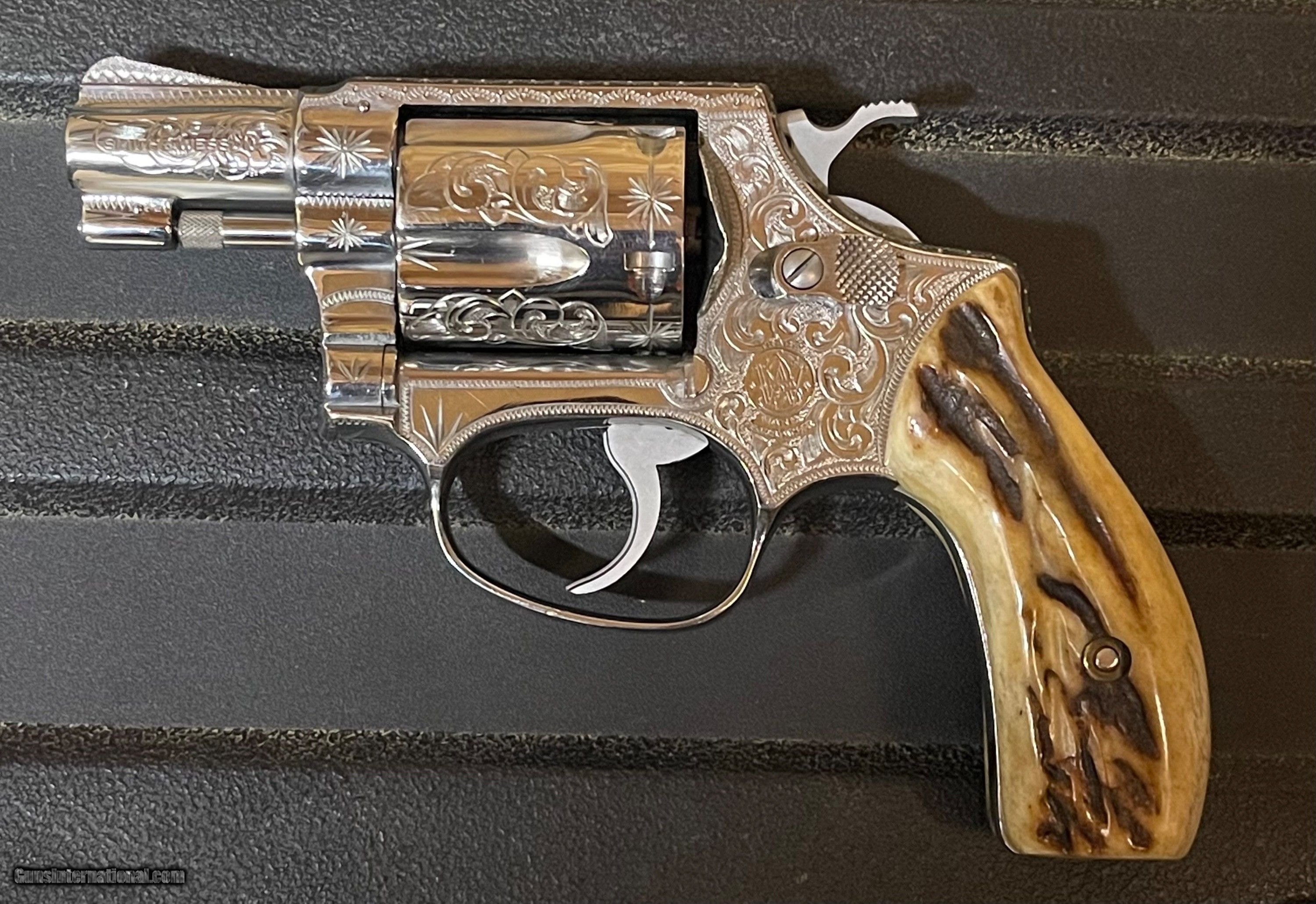 Smith and Wesson 60 (factory engraved/stags)