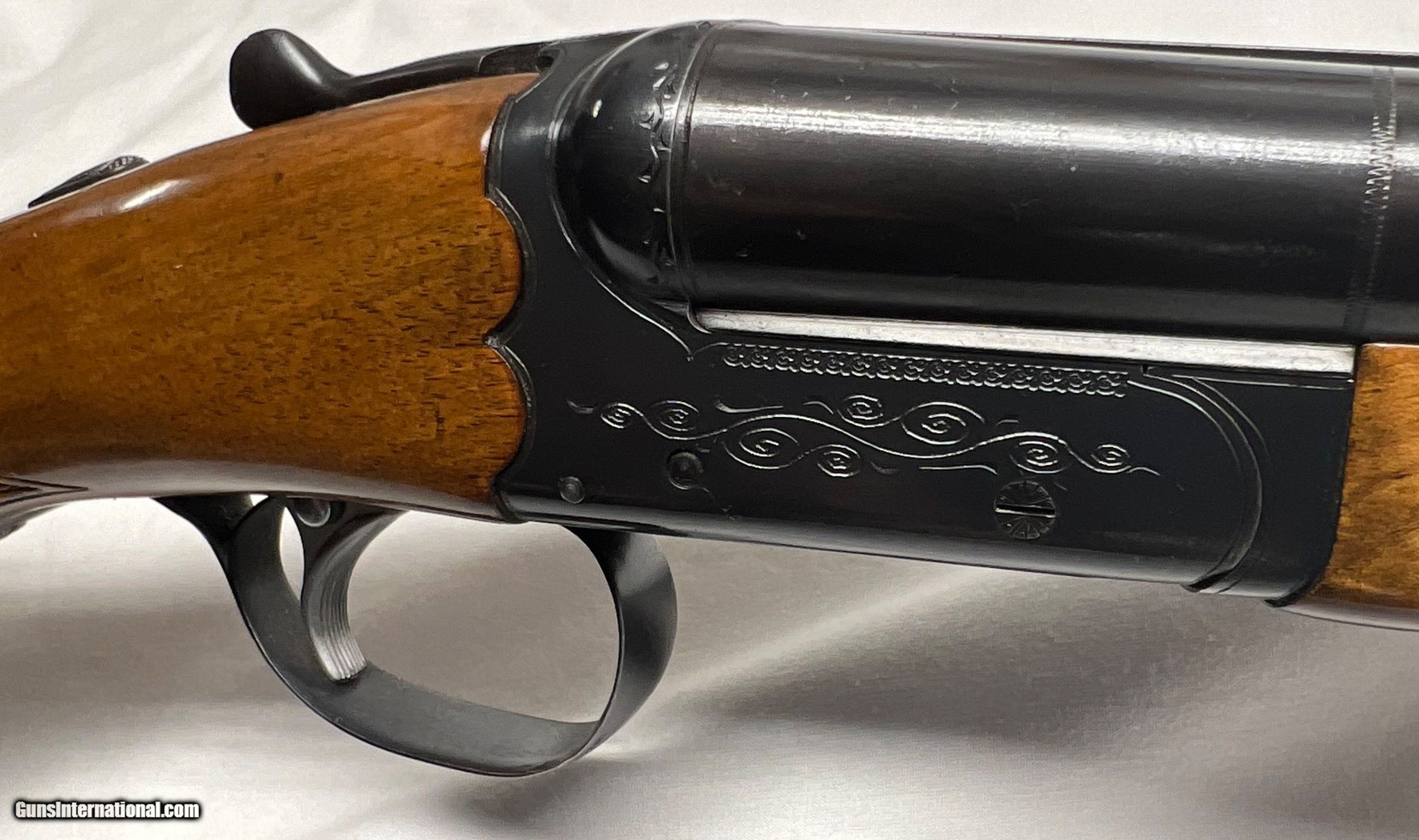 SKB/ Ithaca model 100, 12 gauge double barrel shotgun, 25" BBLS. Choked Imp Cyl/Mod, Excellent Cond.