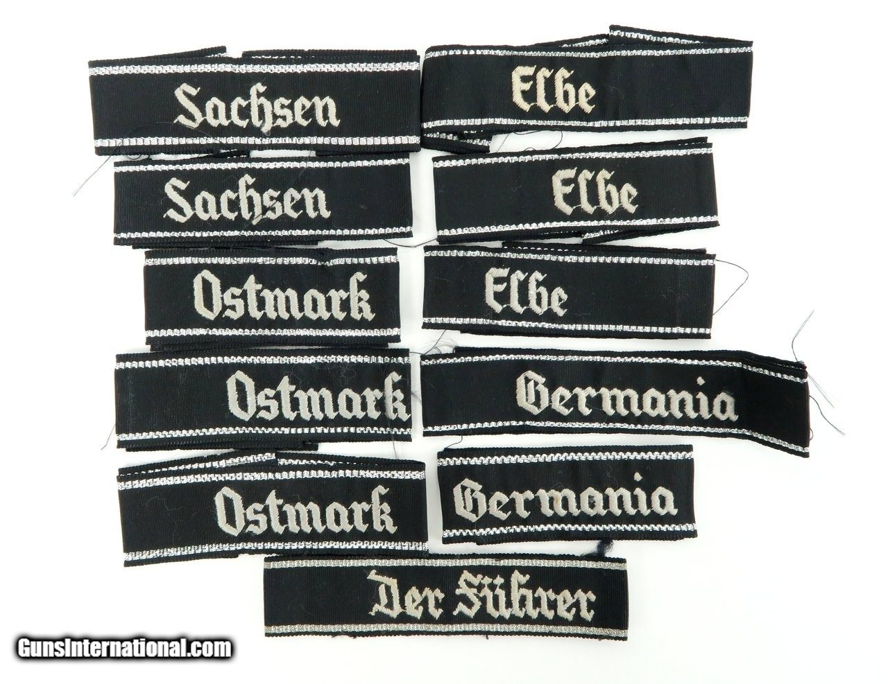 "Lot of Assorted Reproduction SS Cuff Titles (MM911)"