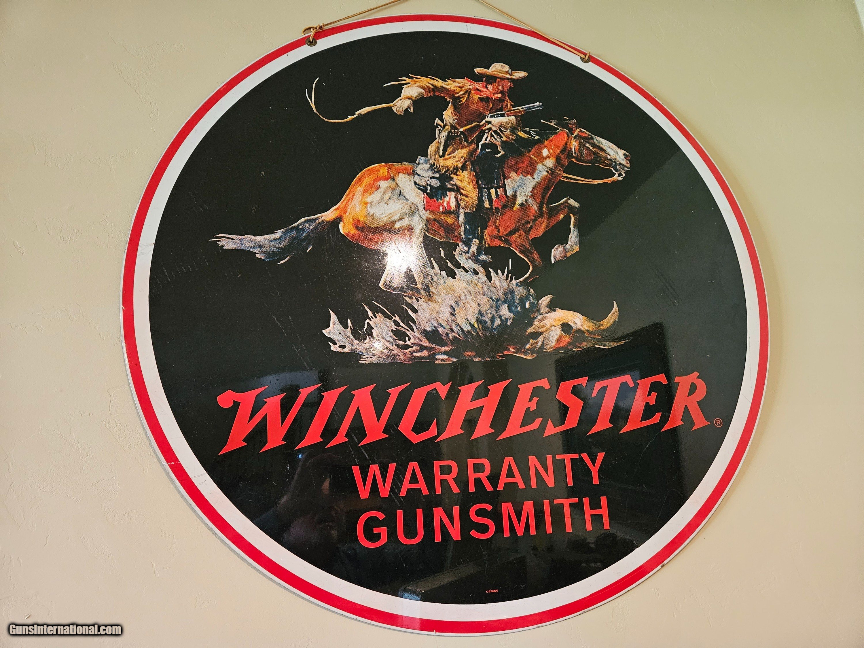 Winchester Gunsmith advertising sign